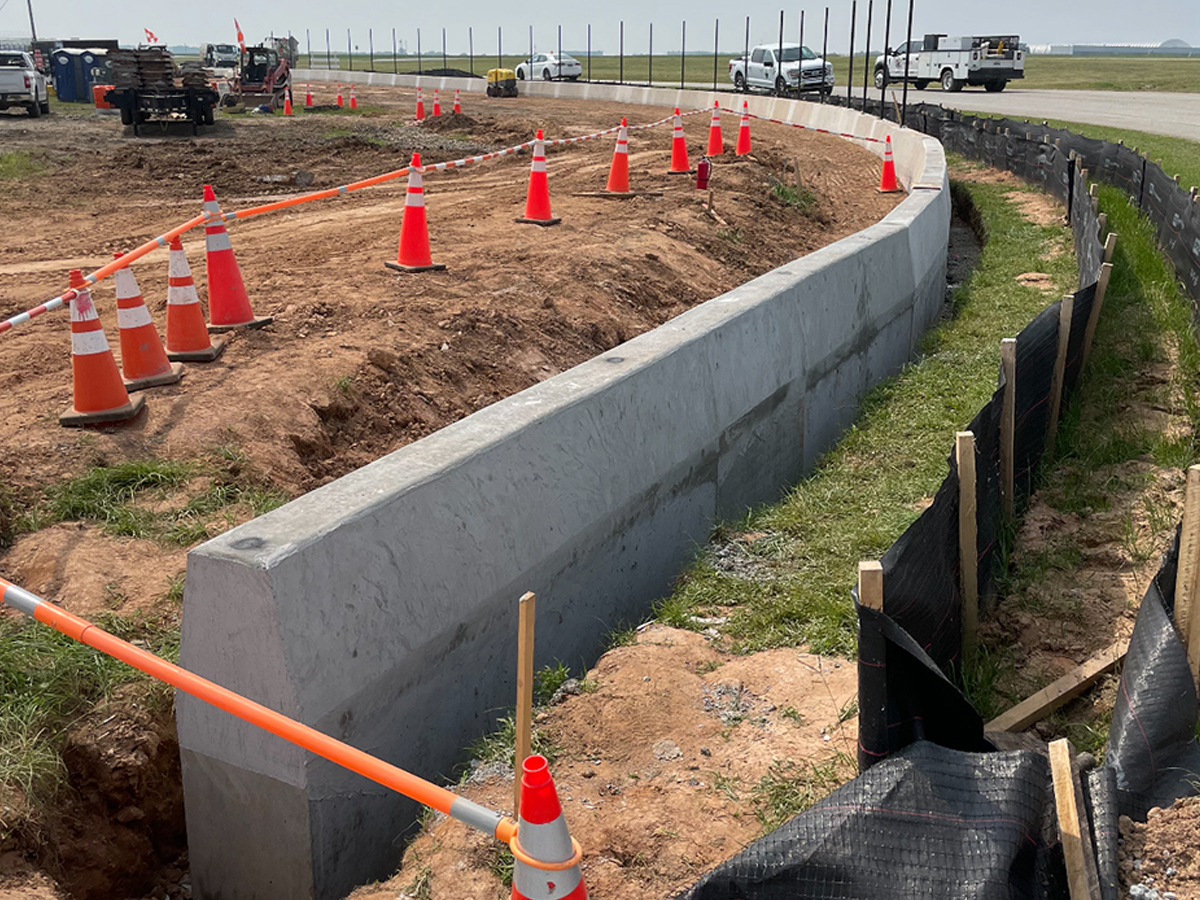 HJAIA T North Ext - Concourse D Widening Modular Yard SIDA WALL - SRC Ventures LLC